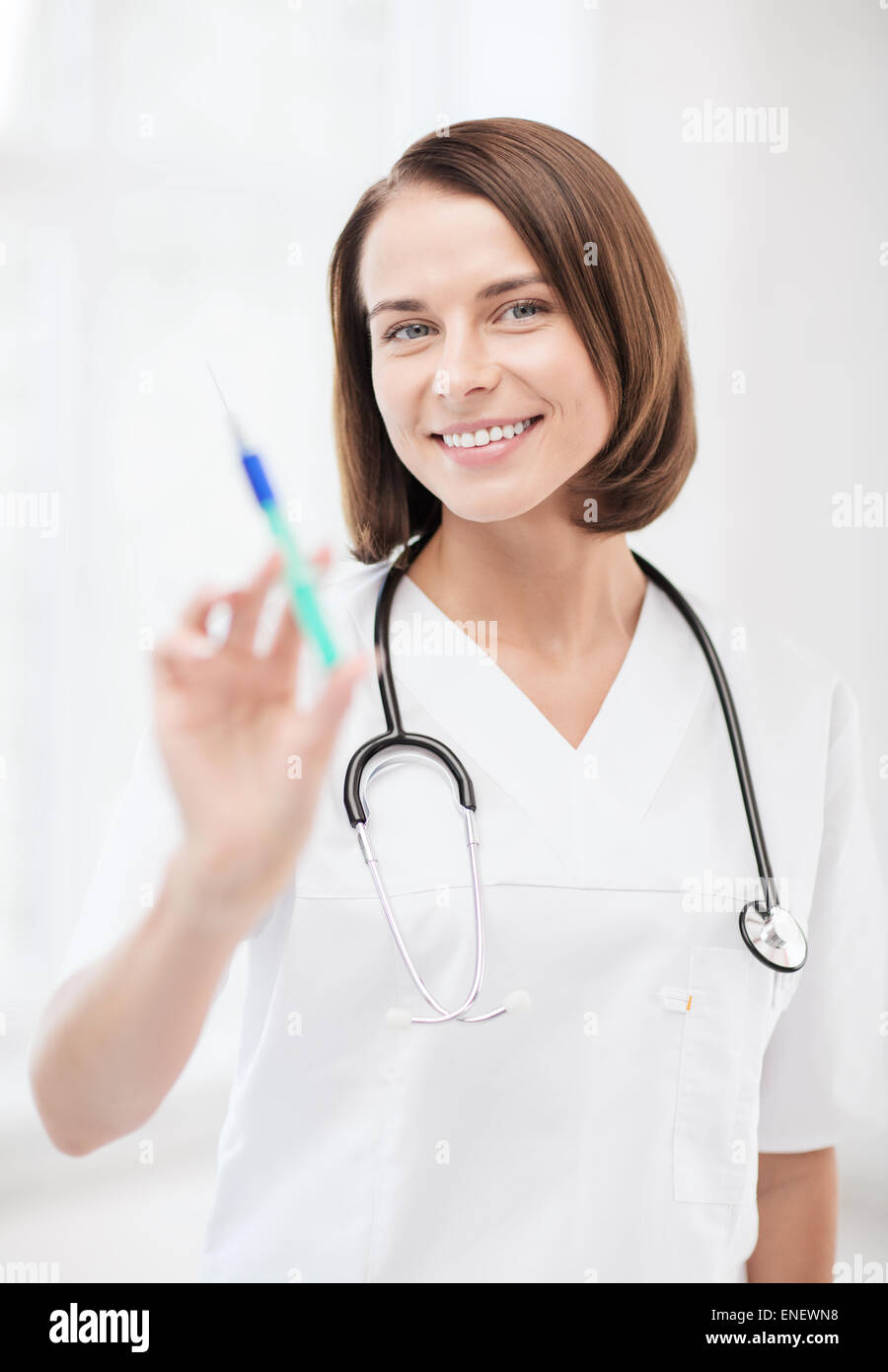 female doctor holding syringe with injection Stock Photo - Alamy