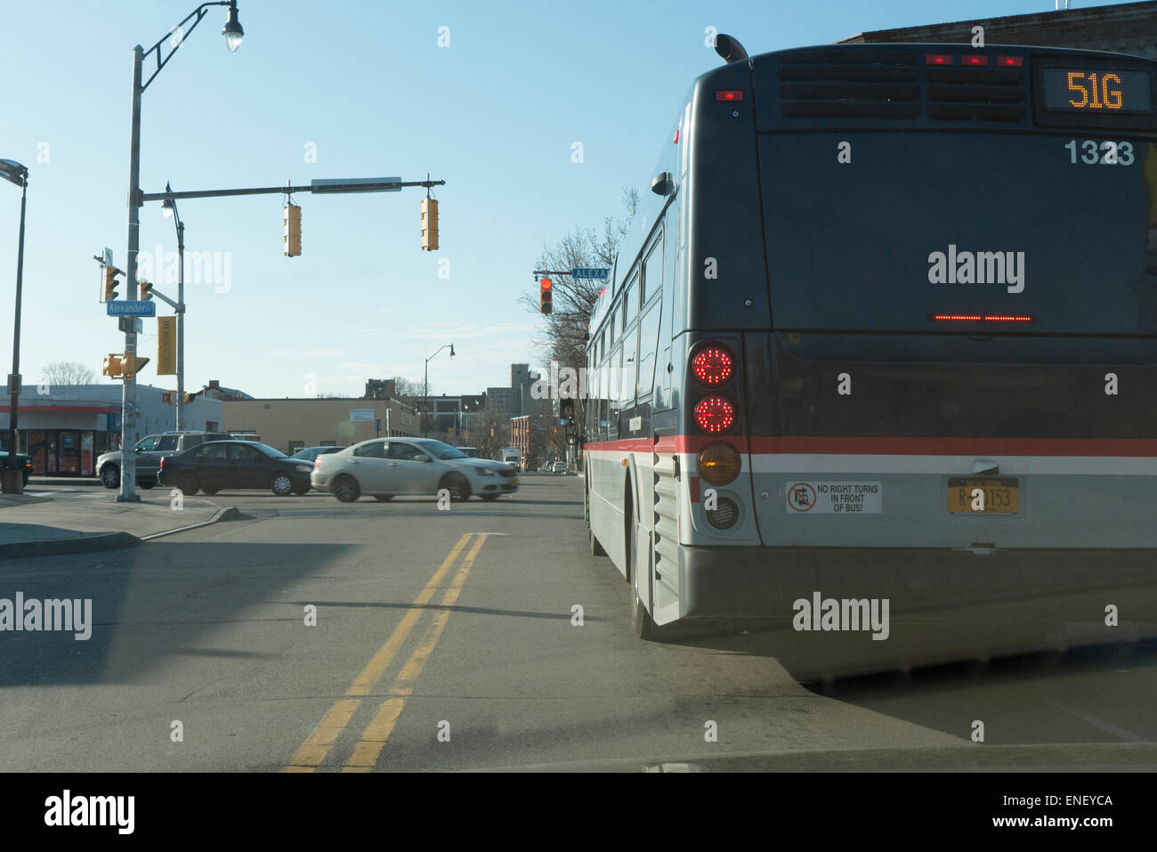 Passenger bus at intersection Stock Photo - Alamy