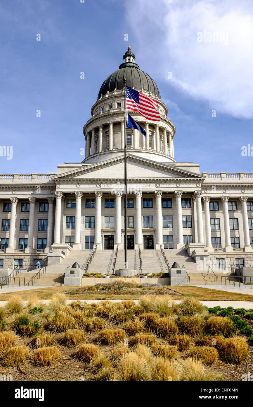 Stars and stripes flag in front of Utah State Capitol building in Salt ...