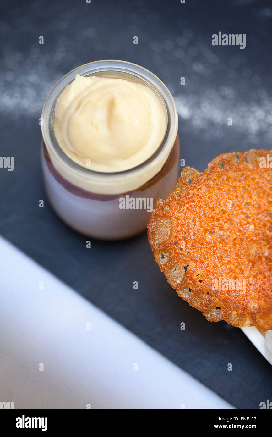 Vanilla cream in a glass and crusty biscuit Stock Photo - Alamy