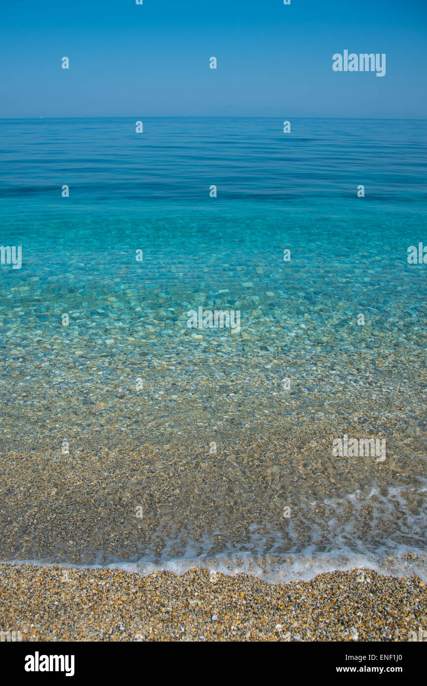 Clear blue Aegean Sea, from beach to horizon Stock Photo - Alamy