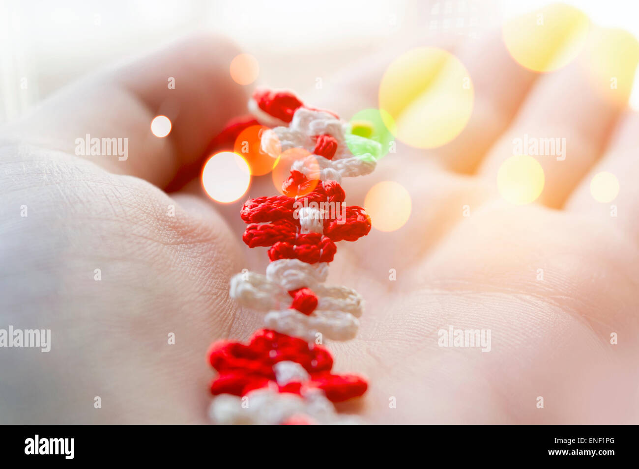 Red string bracelet hi-res stock photography and images - Alamy