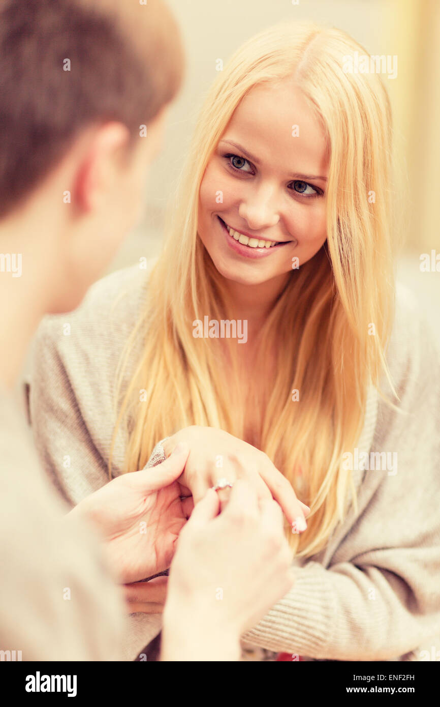 romantic man proposing to beautiful woman Stock Photo - Alamy