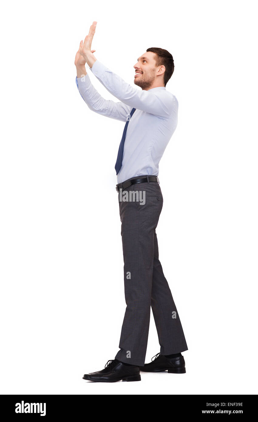 Man pushing imaginary object isolated hi-res stock photography and ...