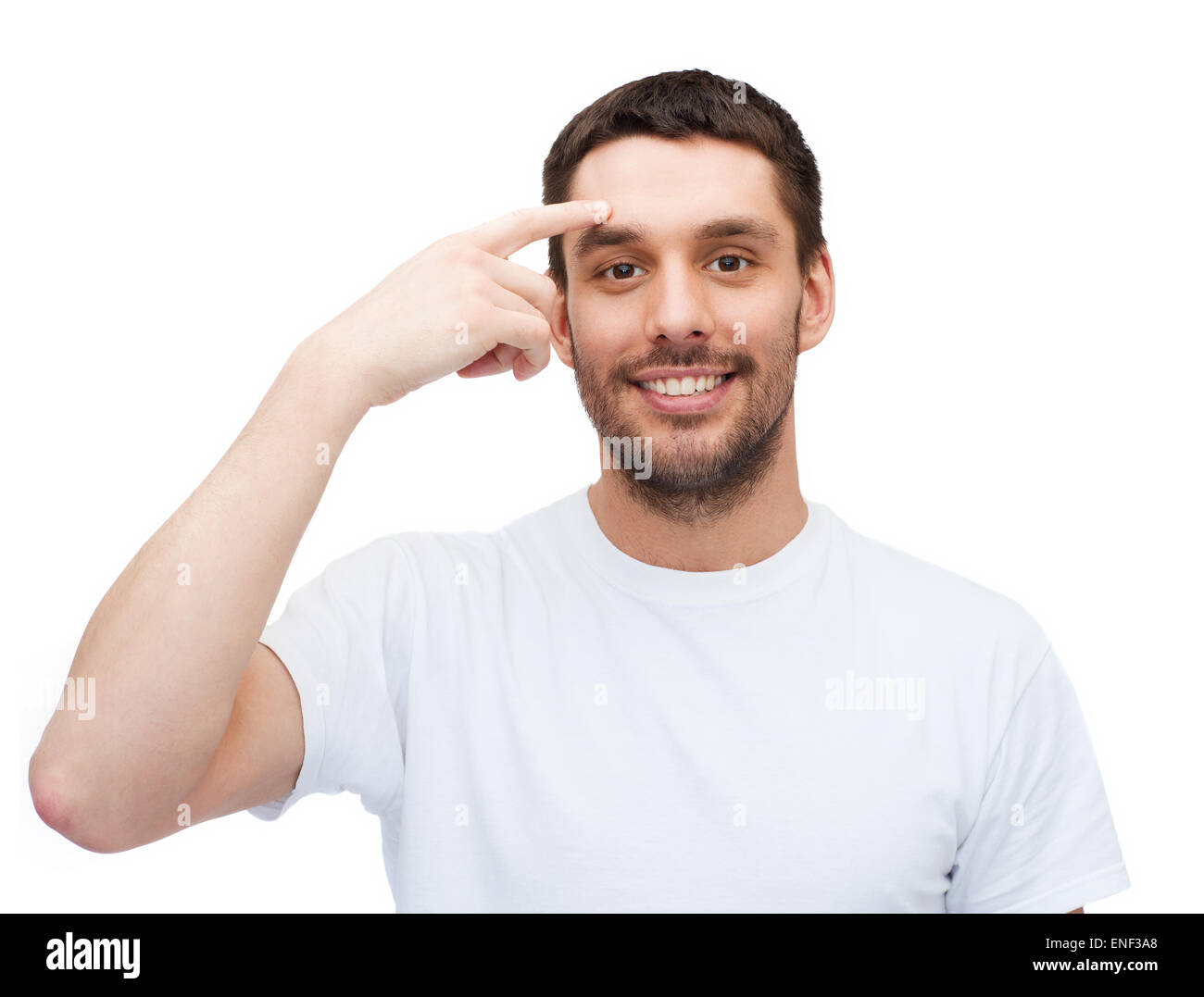 smiling young handsome man pointing to forehead Stock Photo - Alamy