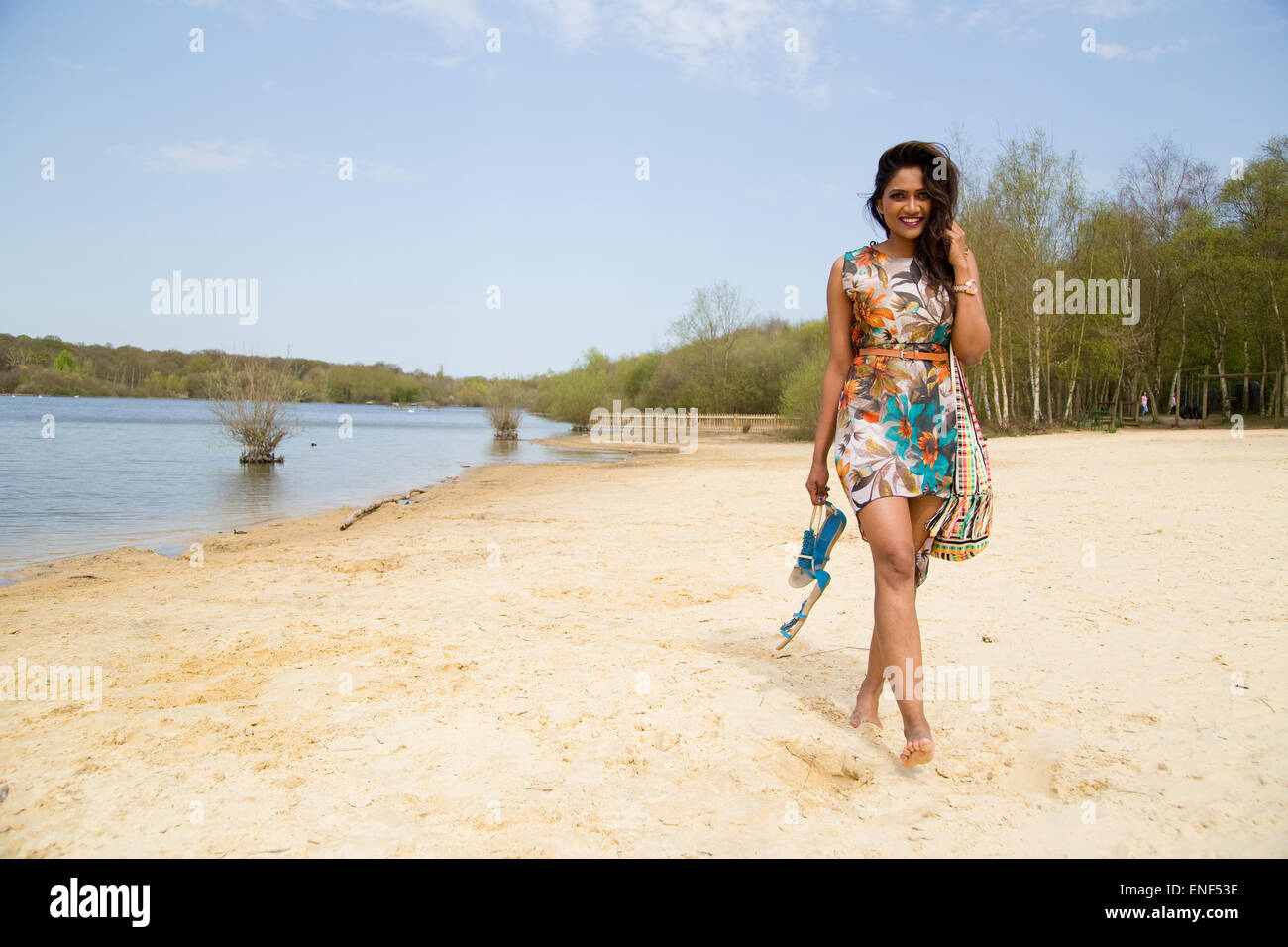 Beautiful woman walking outdoors hi-res stock photography and images ...