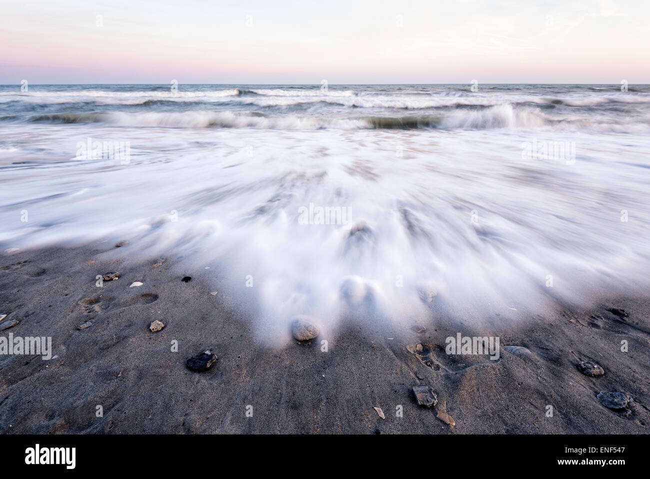 Incoming wave at the beach Stock Photo - Alamy