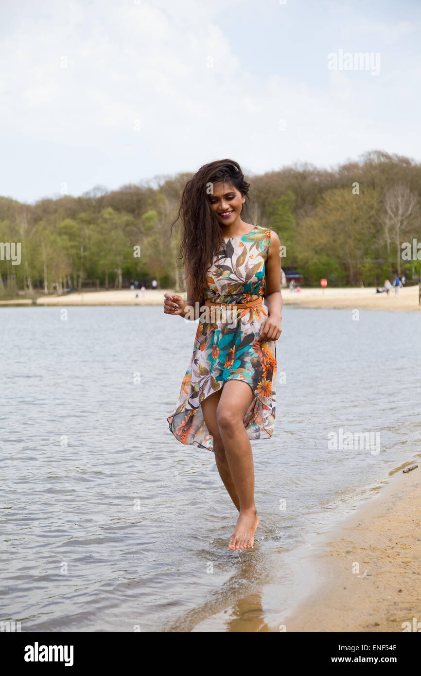 Indian woman running hi-res stock photography and images - Alamy