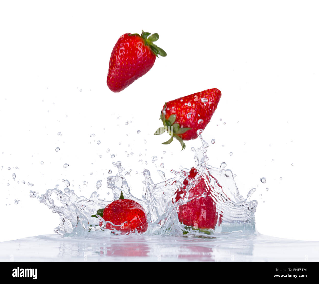 Fresh strawberries in water splash isolated on white backround Stock ...