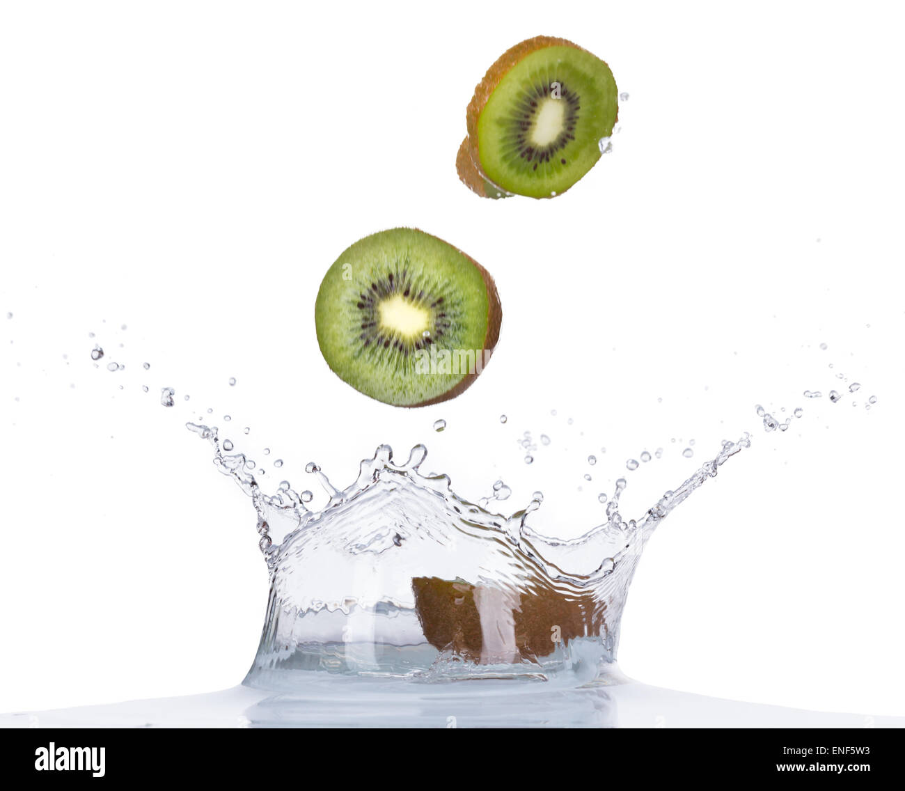 Fresh kiwi in water splash isolated on white backround Stock Photo - Alamy