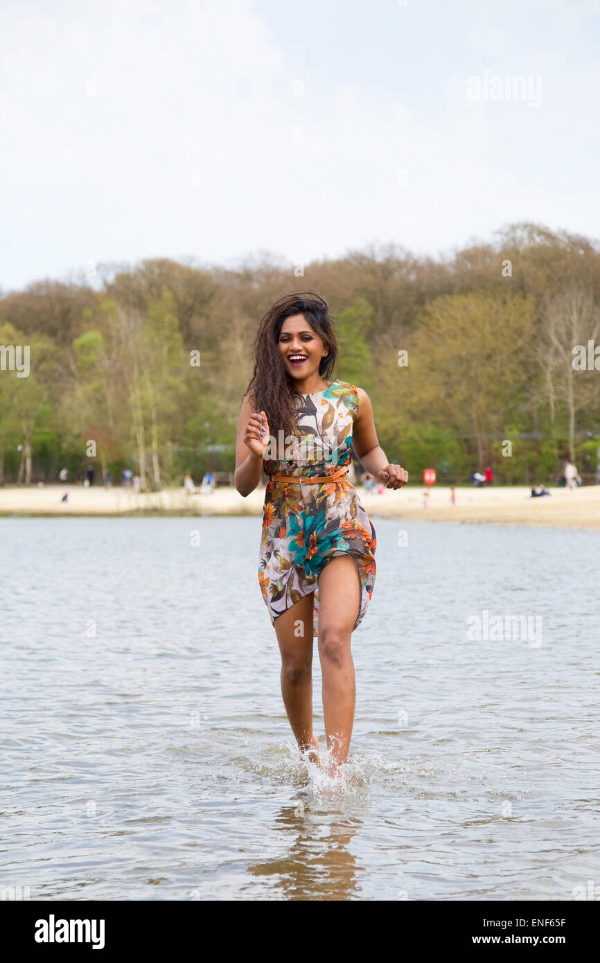 Indian woman running hi-res stock photography and images - Alamy