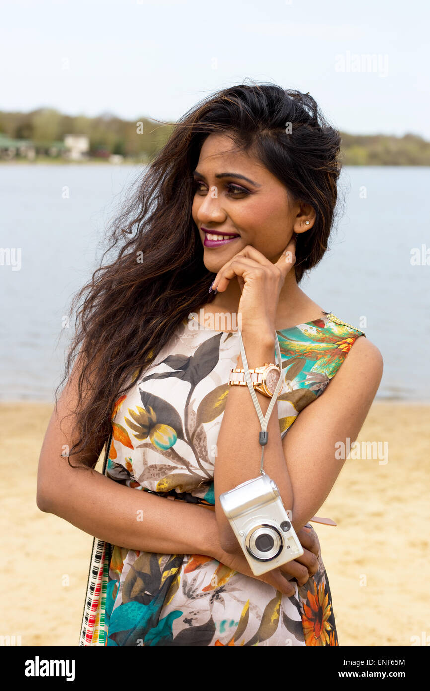 Pensive woman beach hi-res stock photography and images - Alamy