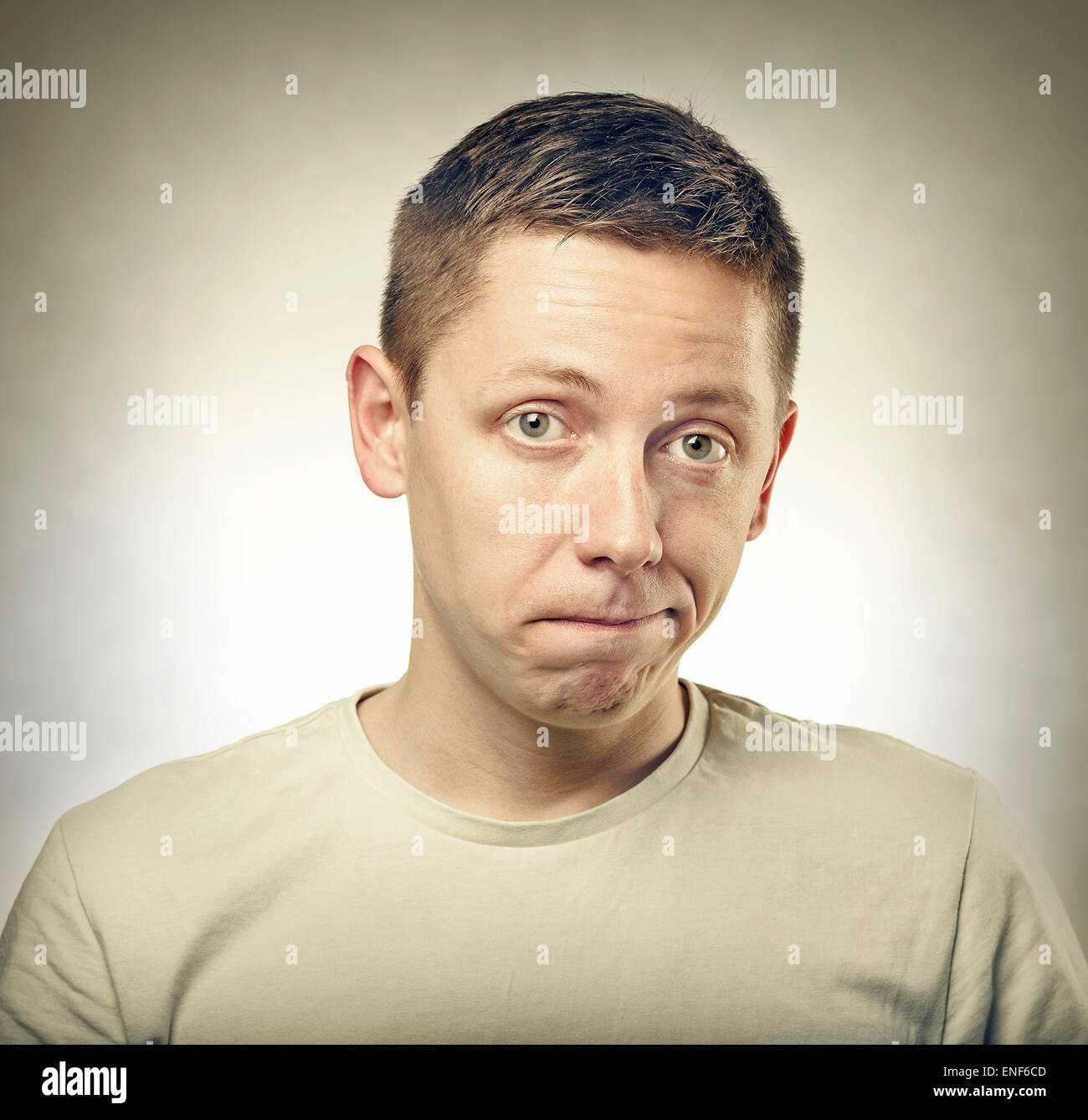 Portrait of perplexed man Stock Photo - Alamy