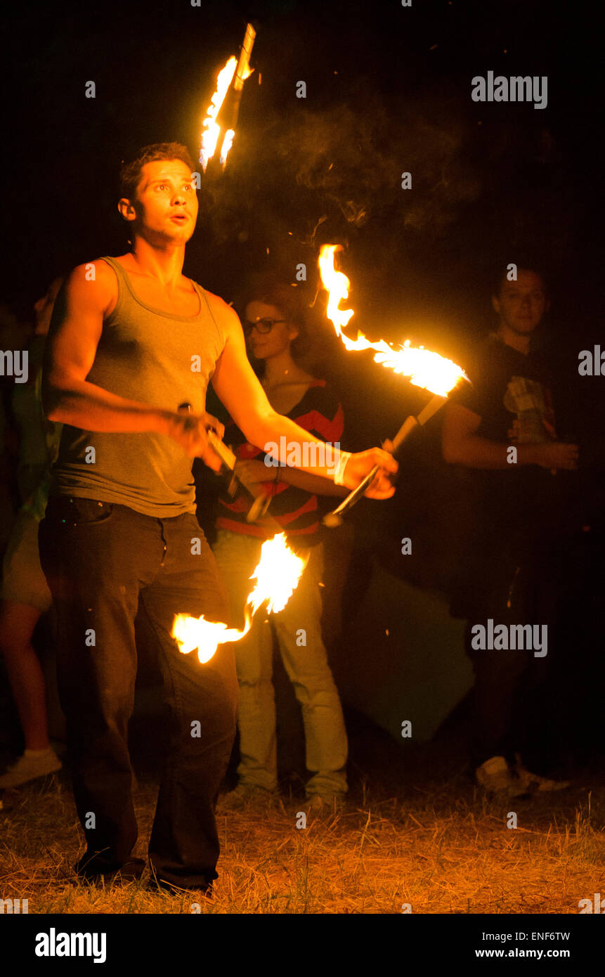 Juggler with fire Stock Photo - Alamy