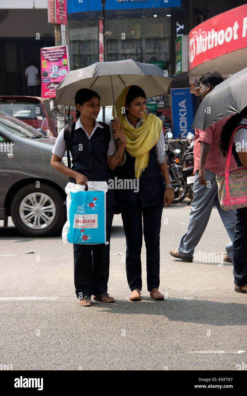 Pedestrians waiting to cross a heavy traffic-congested street in ...