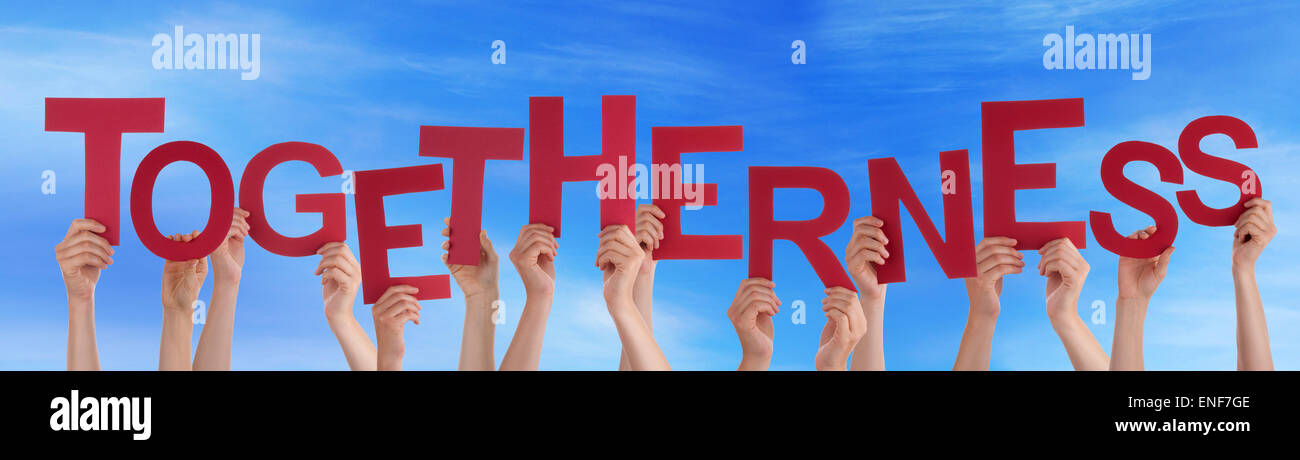 Hands Holding Red Word Togetherness Blue Sky Stock Photo - Alamy