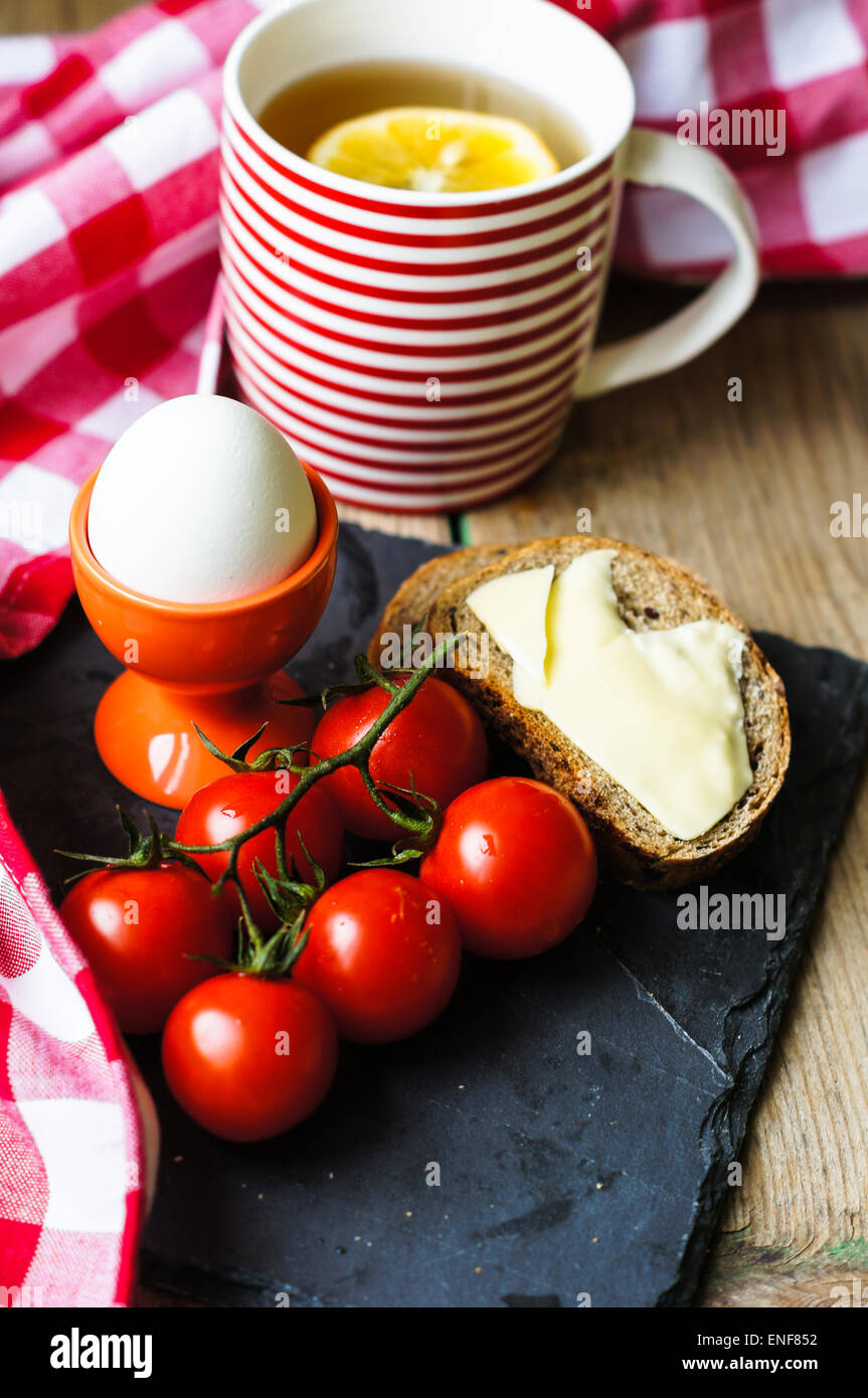 Healthy breakast with eggs, tea and bread with butter Stock Photo - Alamy