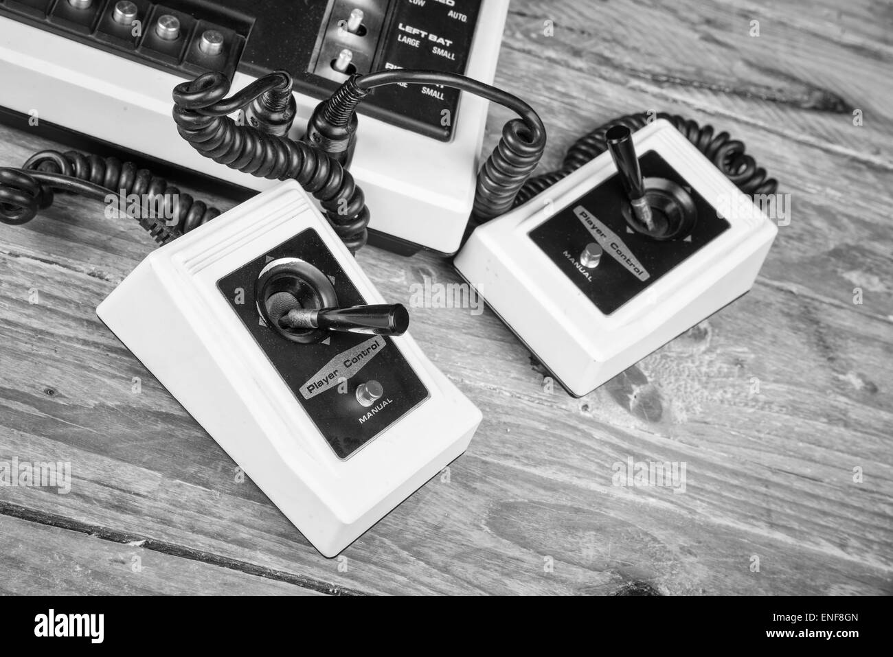 Old game console with very simple wired joysticks Stock Photo - Alamy
