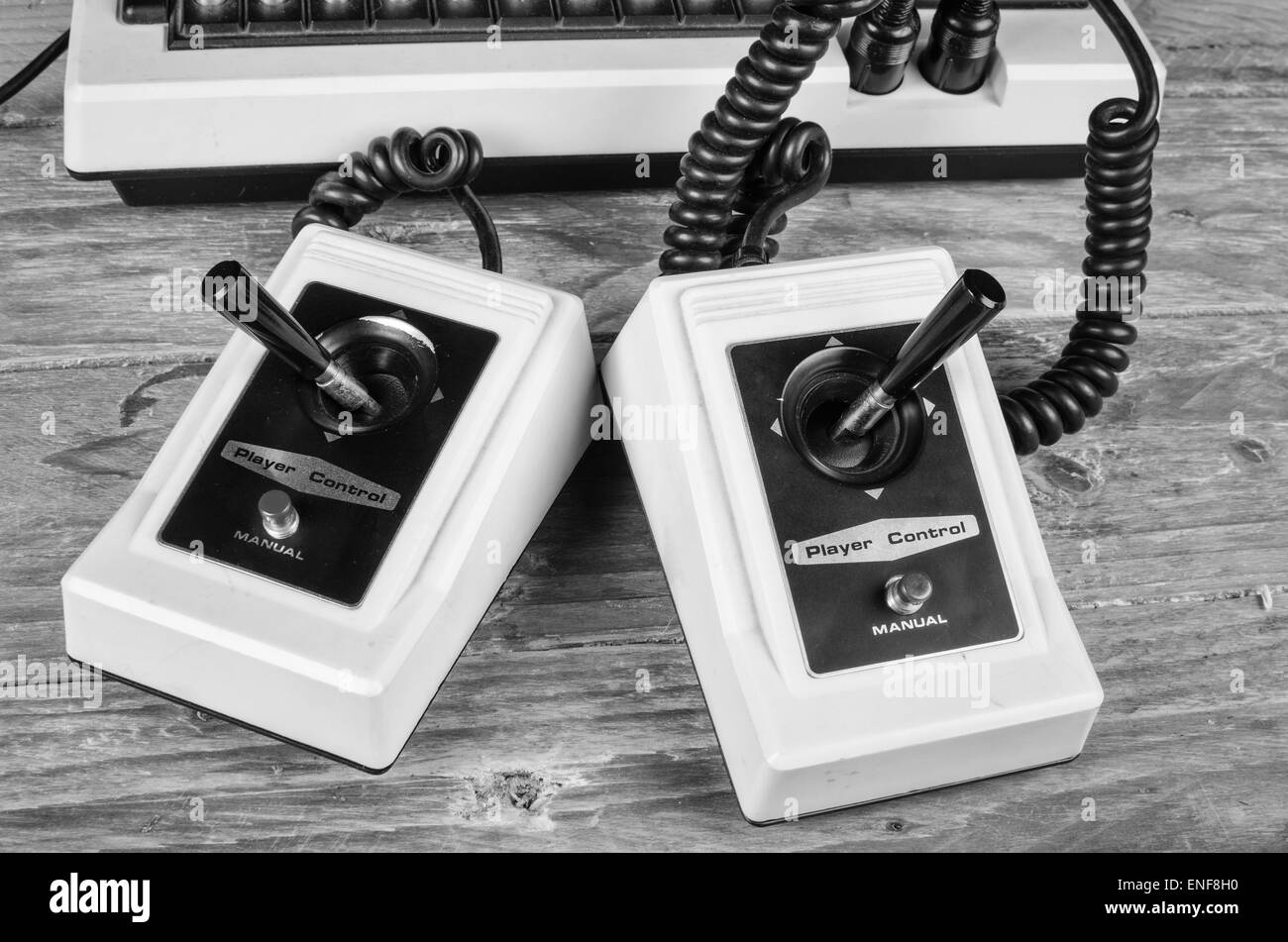 Old game console with very simple wired joysticks Stock Photo - Alamy