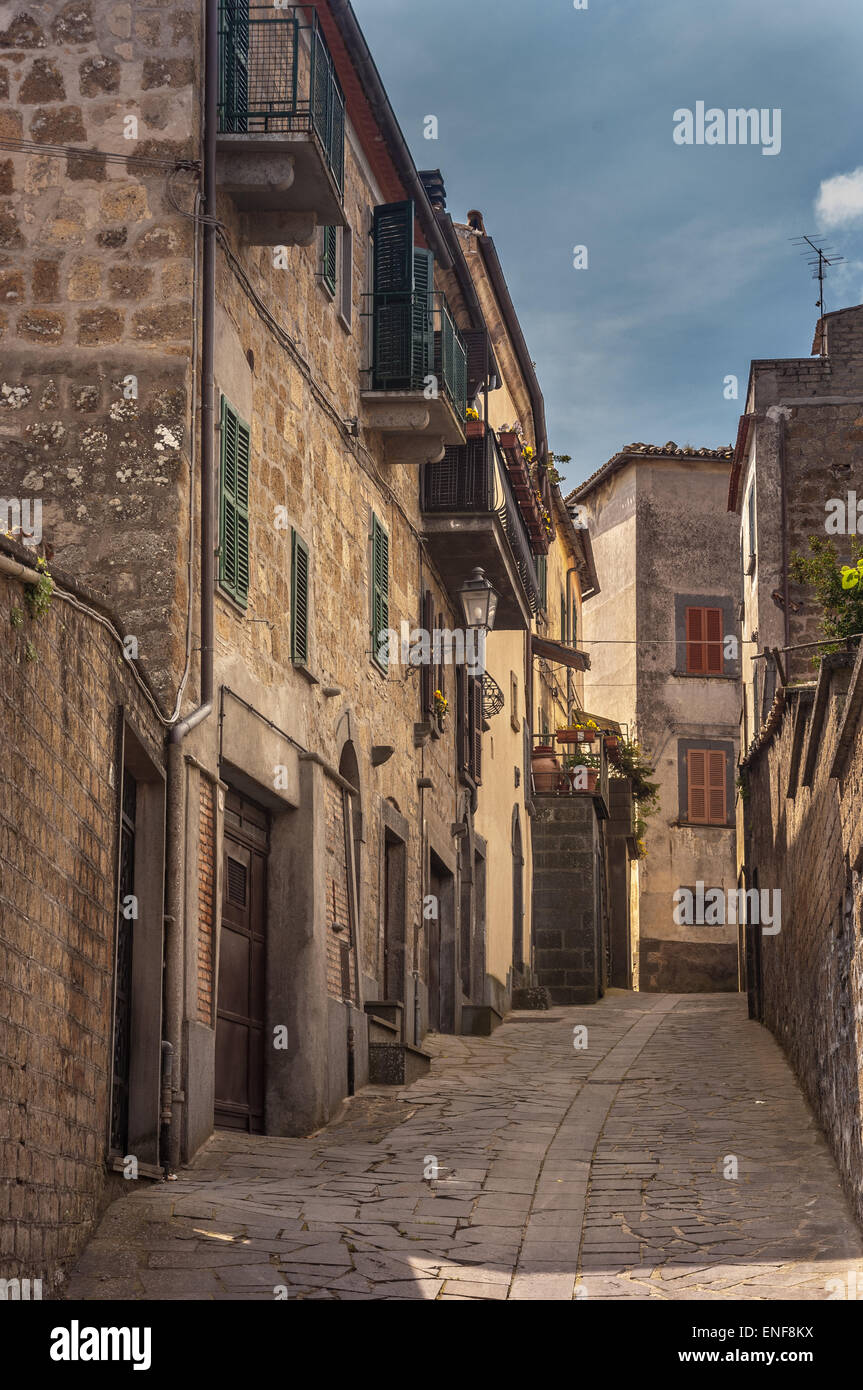 Brick slate passageway in rustic neighborhood of Civita di Bagnoregio ...