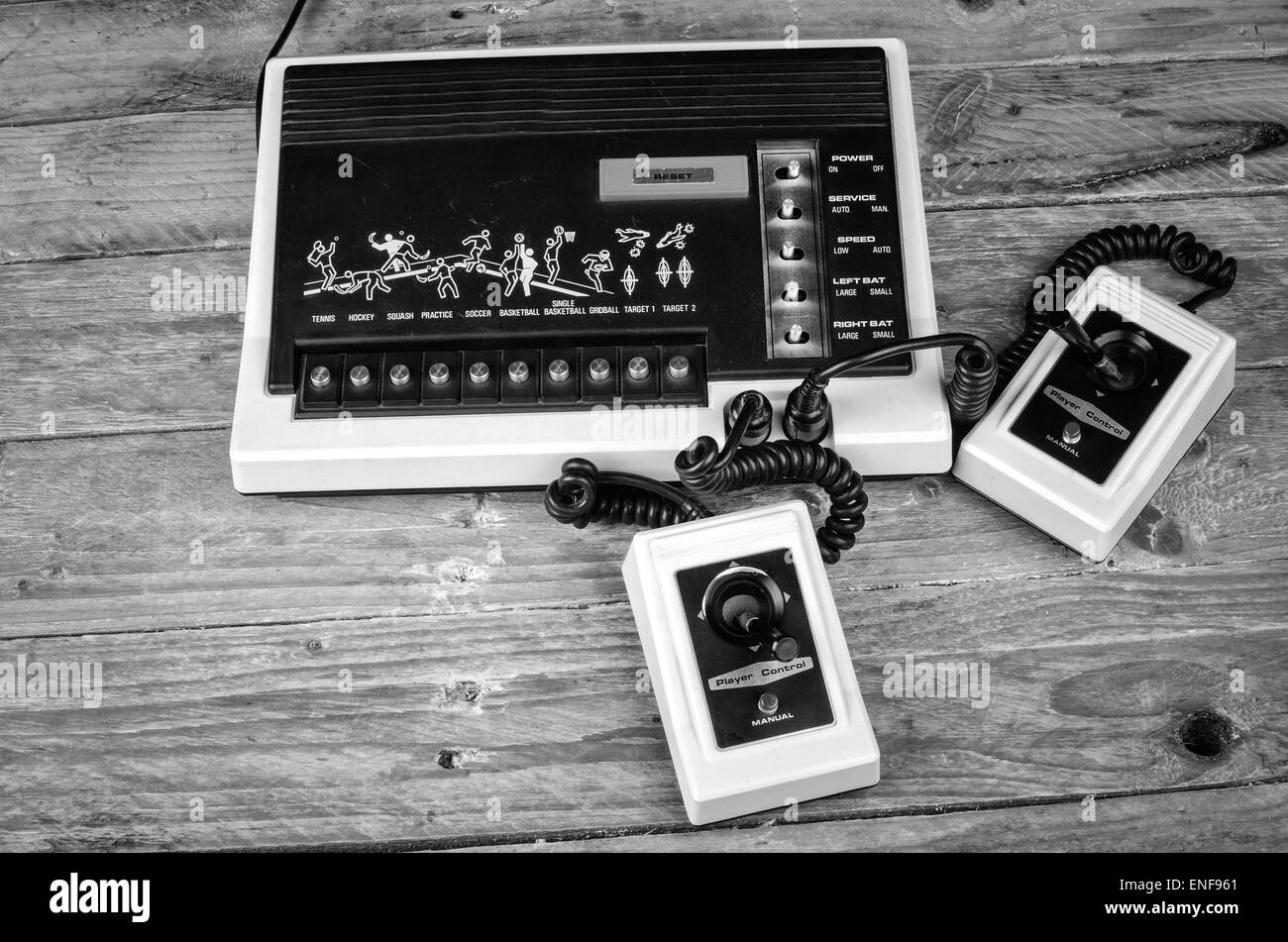 Old game console with very simple wired joysiticks Stock Photo - Alamy