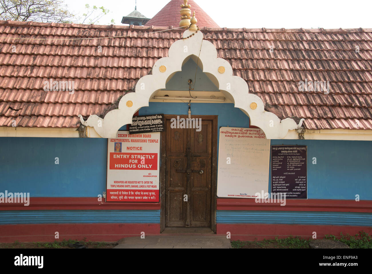 A large notice at the main door of a Hindu temple,' Entry Strictly for ...