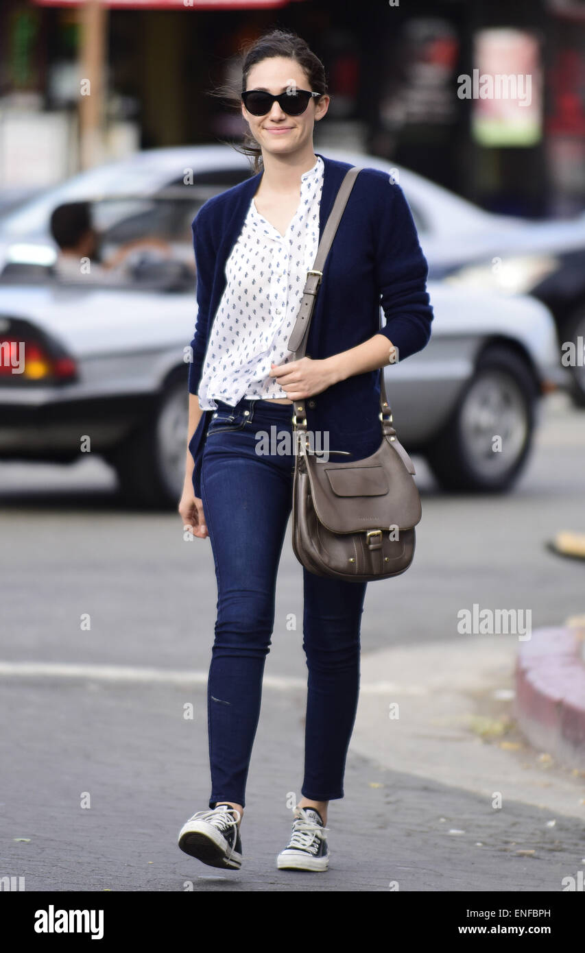 Emmy Rossum bares her midriff section as she leaves a restaurant after ...