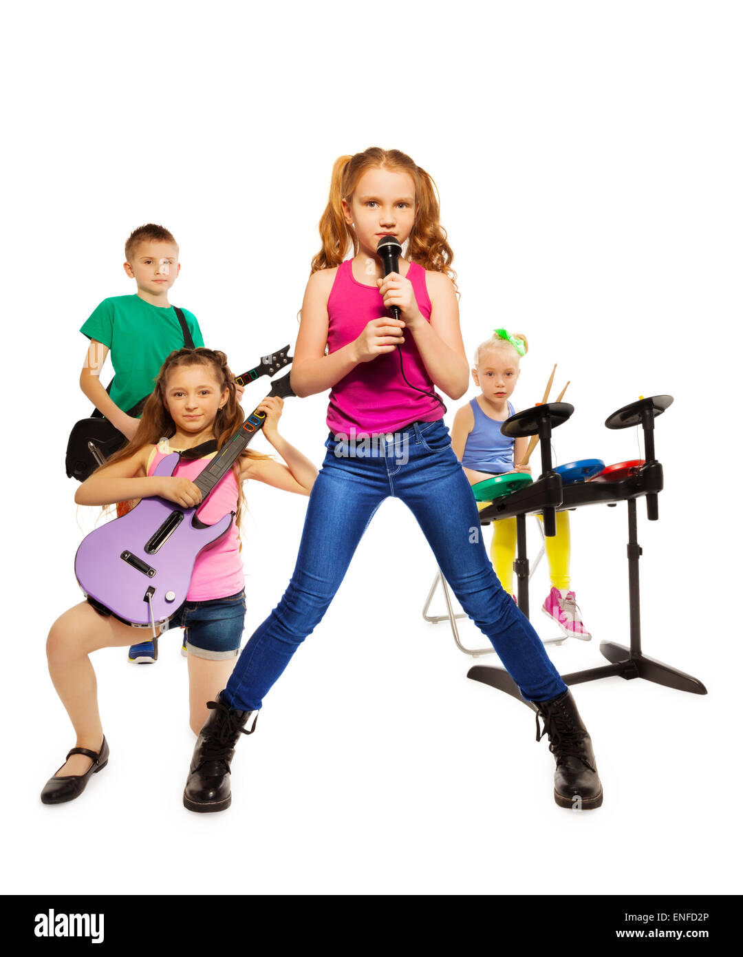 Children play musical instruments as rock group Stock Photo - Alamy