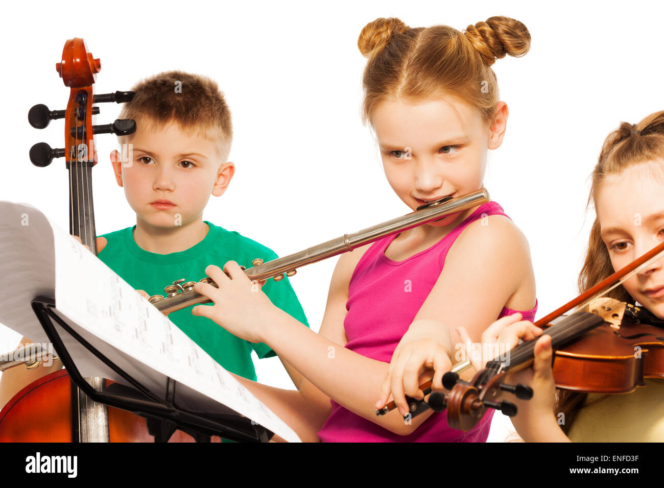 Group of cute kids playing on musical instruments Stock Photo - Alamy