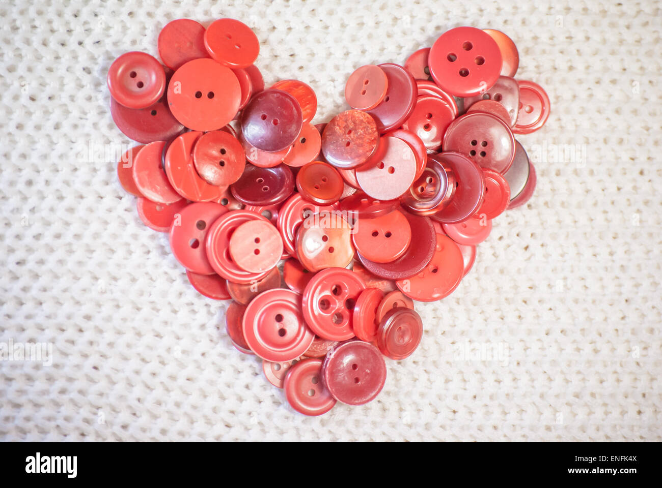 heart of red buttons Stock Photo - Alamy