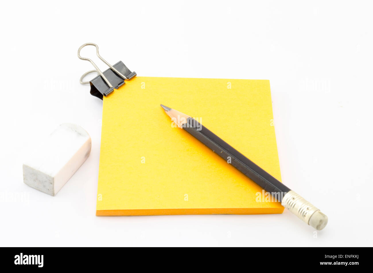 orange sticky note with black pencil isolated on white background Stock ...