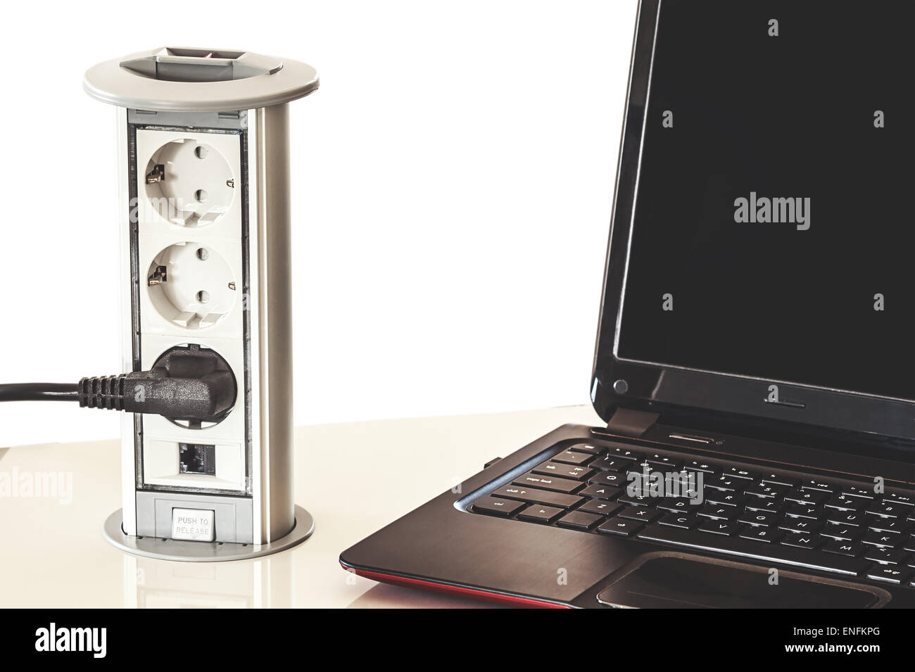 Details of an electric plug built in table Stock Photo - Alamy