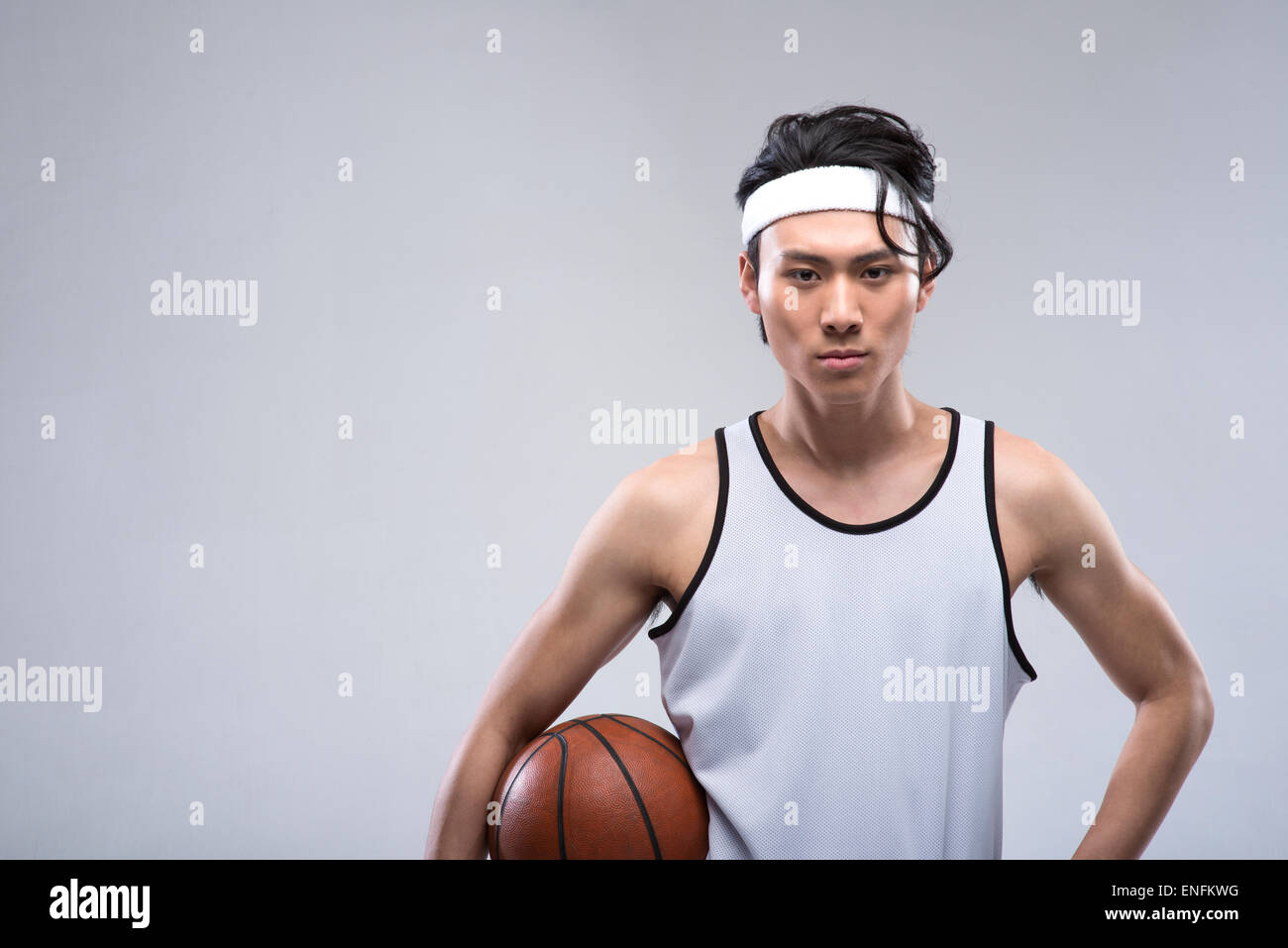Young man holding basketball Stock Photo - Alamy Young man holding basketball Stock Photo - Alamy