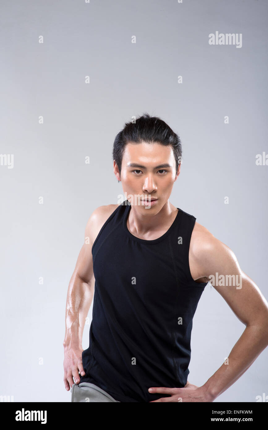 Young muscular man doing exercise hi-res stock photography and images ...