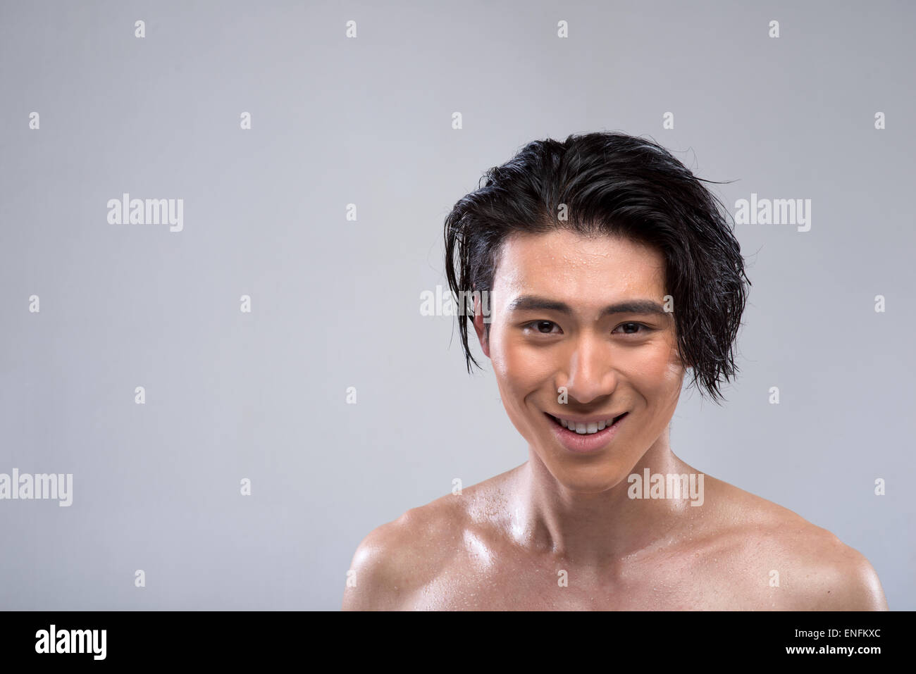 Young man sweating with wet hair Stock Photo - Alamy