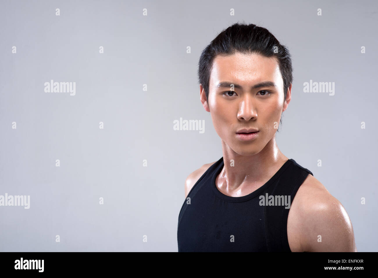 Young man sweating after exercise Stock Photo - Alamy