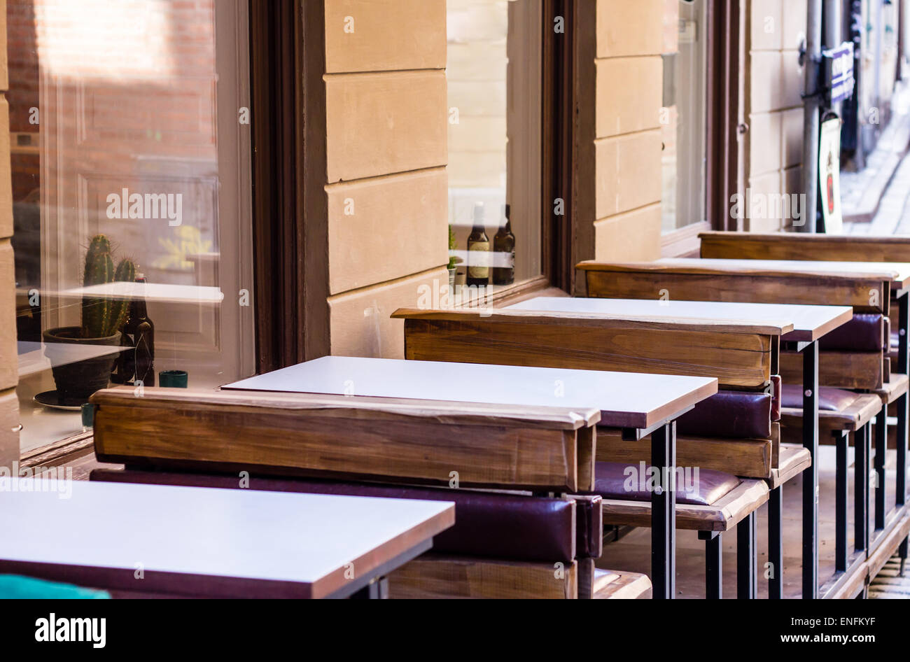 Cafe with tables and chairs on terrace Stock Photo - Alamy