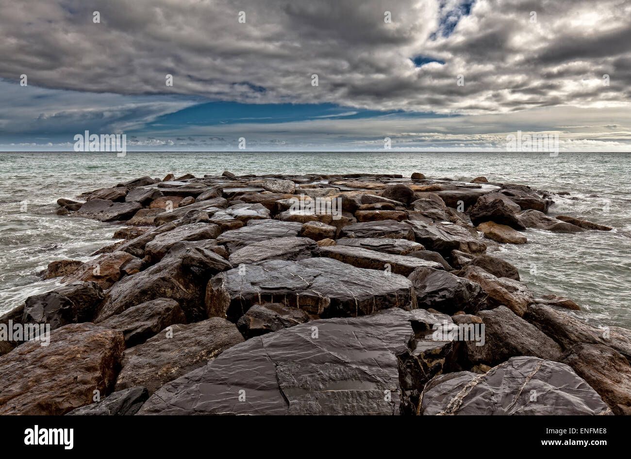 rocks reaf and sea background Stock Photo - Alamy