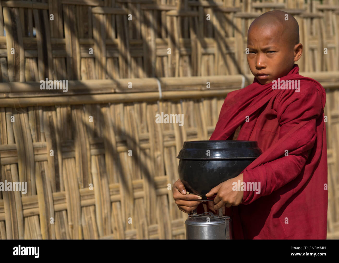 Novice Monk Begging For Food On A Road, Mrauk U, Myanmar Stock Photo ...