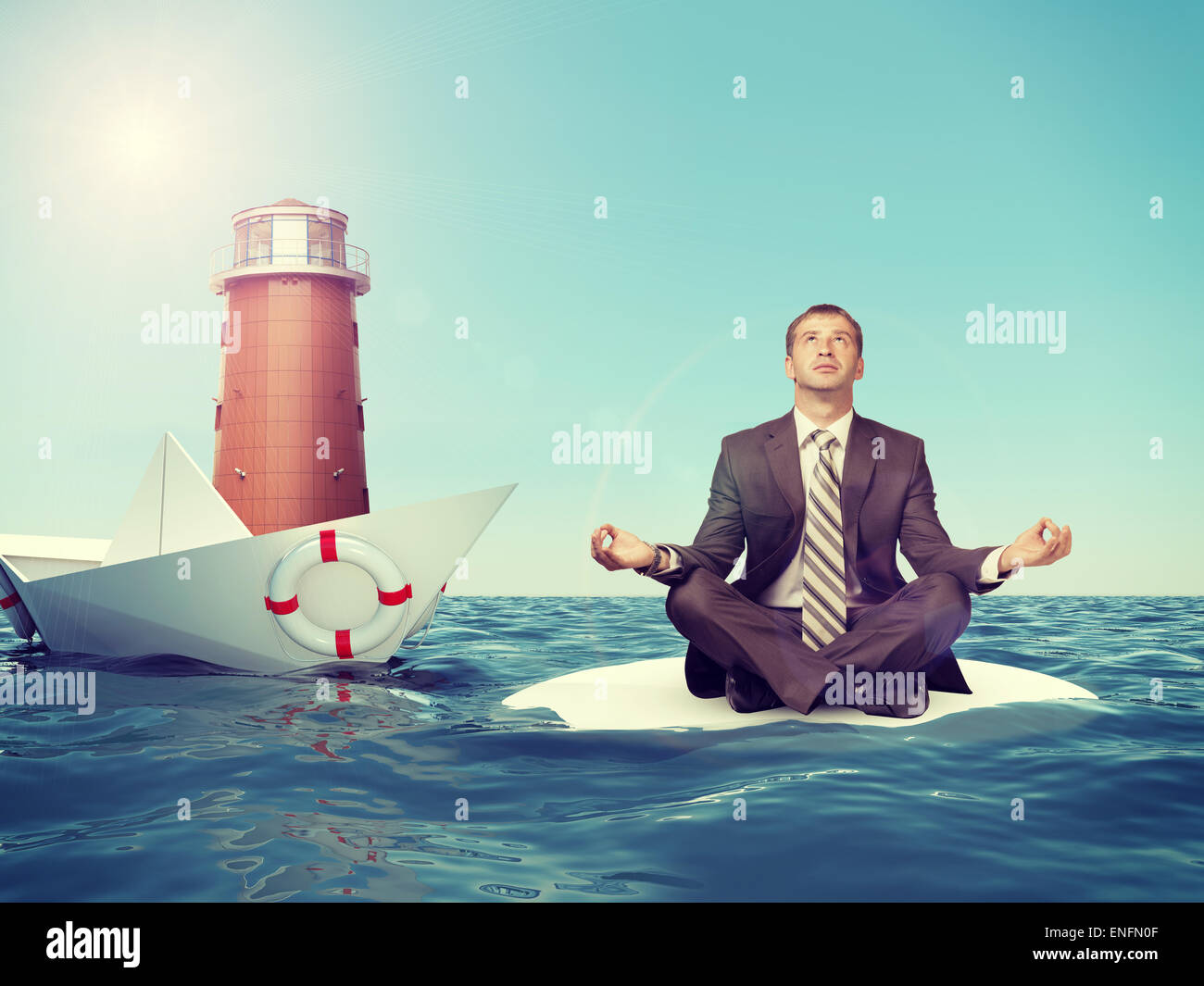 Businessman sitting in lotus position Stock Photo - Alamy