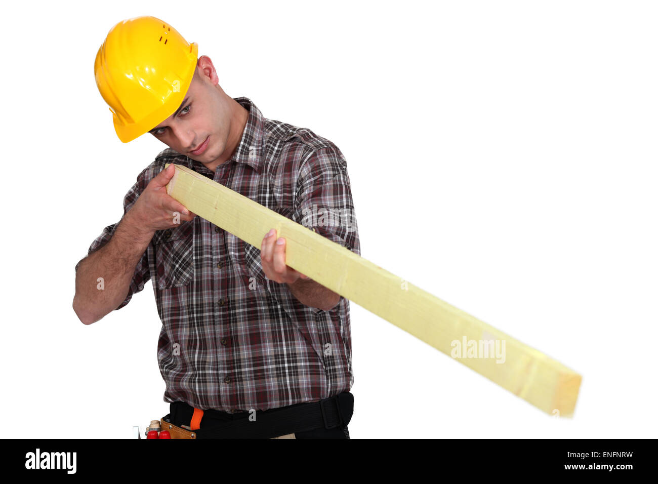 Man holding wooden beam Stock Photo - Alamy