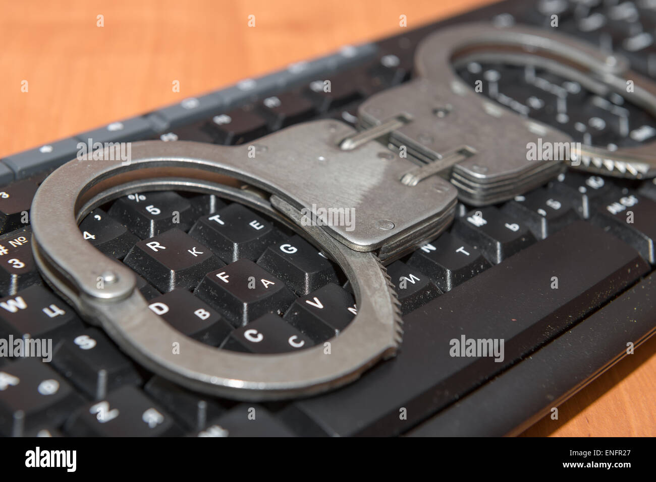 Digital handcuffs hi-res stock photography and images - Alamy