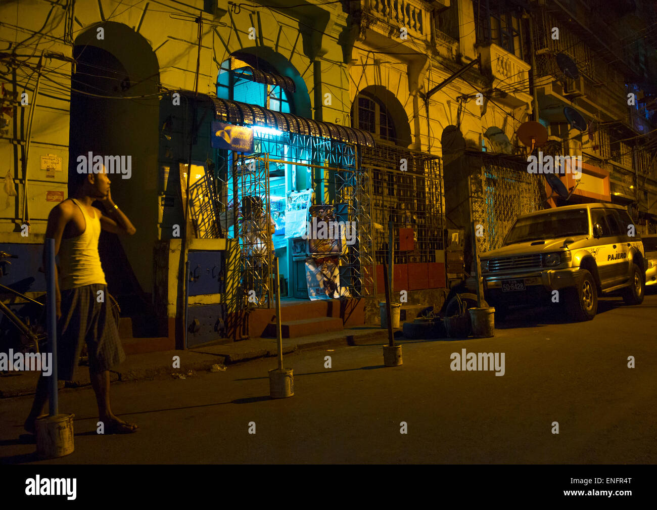 Man Calling On The Phone In The Old Colonial Dictrict, Yangon, Myanmar ...