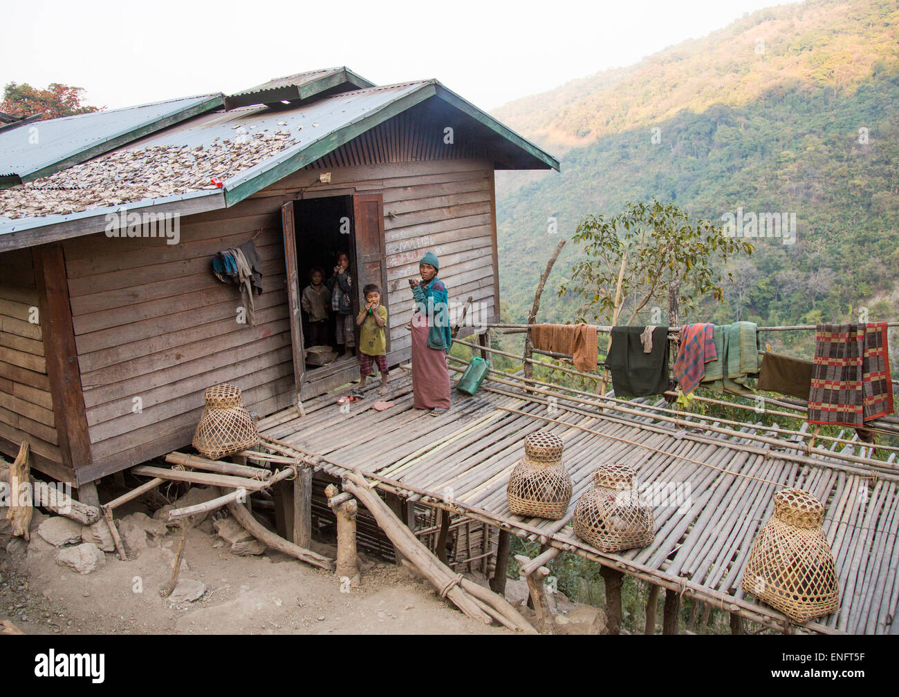 Chin Family In A Typical Bamboo House In The Hills, Mindat, Myanmar ...