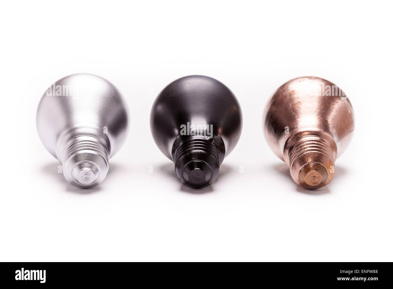 Painted light bulbs on a white background for concept as energy and ...