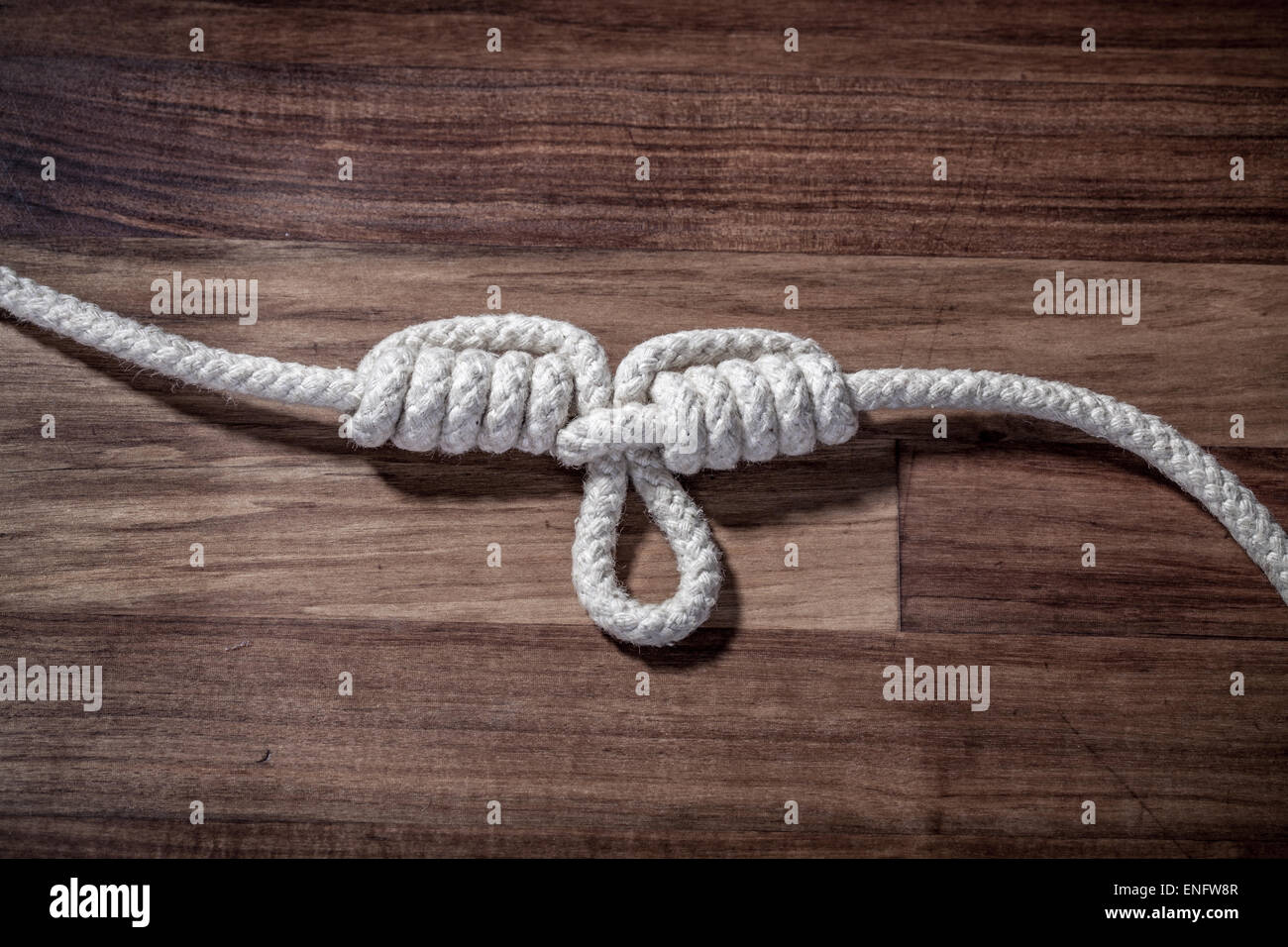 Dropper Loop knot with white rope Stock Photo - Alamy