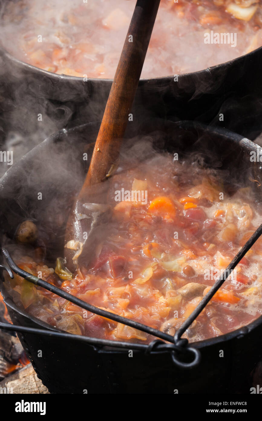 Soup cooking in medieval pot Stock Photo - Alamy