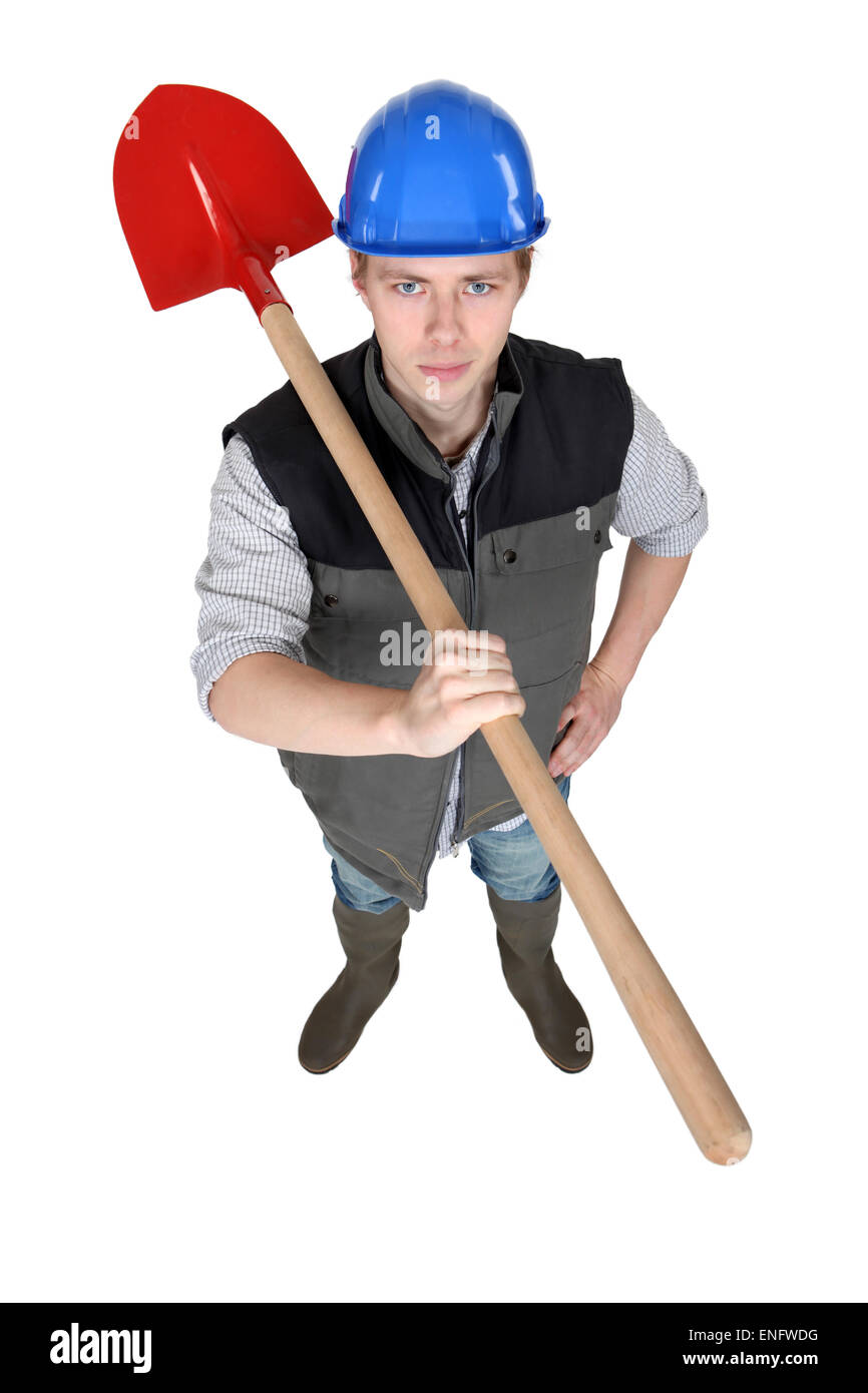 Construction worker with a shovel Stock Photo - Alamy