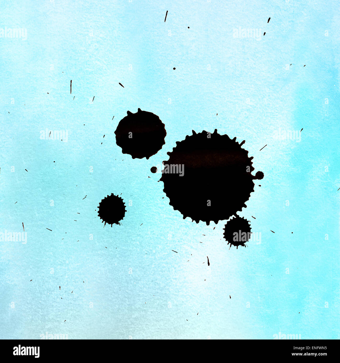 Ink spot on blue textured paper Stock Photo - Alamy