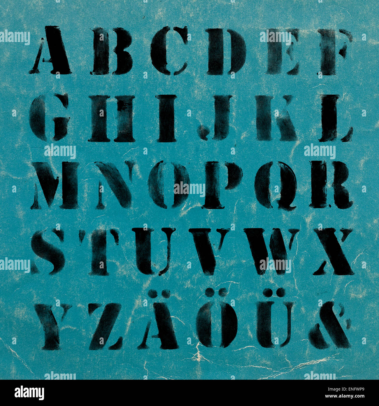 Vintage letters on paper texture background Stock Photo - Alamy